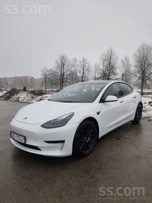 White Tesla Model 3 2021 in Riga, with an engine capacity of 0.00 L and mileage of 93 thousand km for 25399 €, photo  on AUTOMOTO.COM.LV