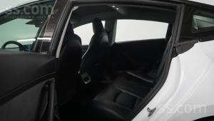 White Tesla Model 3 2021 in Riga, with an engine capacity of 0.00 L and mileage of 63 thousand km for 24500 €, photo 7 on AUTOMOTO.COM.LV