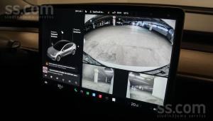 White Tesla Model 3 2021 in Riga, with an engine capacity of 0.00 L and mileage of 63 thousand km for 24500 €, photo 19 on AUTOMOTO.COM.LV