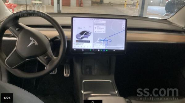 White Tesla Model 3 2021 in Riga, with an engine capacity of 0.00 L and mileage of 100 thousand km for 24990 €, photo 6 on AUTOMOTO.COM.LV