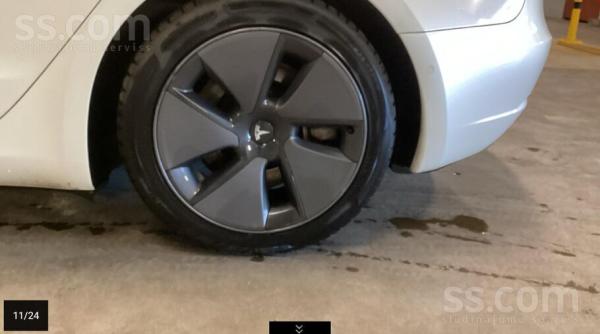 White Tesla Model 3 2021 in Riga, with an engine capacity of 0.00 L and mileage of 100 thousand km for 24990 €, photo 10 on AUTOMOTO.COM.LV