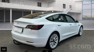 White Tesla Model 3 2021 in Riga, with an engine capacity of 0.00 L and mileage of 68 thousand km for 26250 €, photo 3 on AUTOMOTO.COM.LV