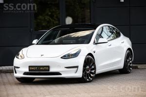 White Tesla Model 3 2021 in Riga, with an engine capacity of 0.00 L and mileage of 82 thousand km for 28500 €, photo 4 on AUTOMOTO.COM.LV