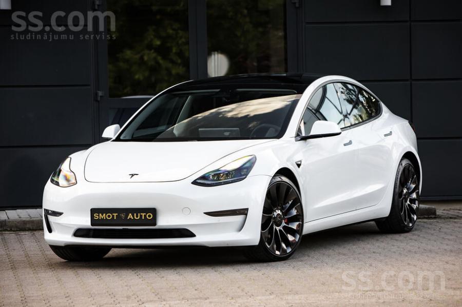 White Tesla Model 3 2021 in Riga, with an engine capacity of 0.00 L and mileage of 82 thousand km for 28500 €, photo 4 on AUTOMOTO.COM.LV