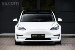 White Tesla Model 3 2021 in Riga, with an engine capacity of 0.00 L and mileage of 82 thousand km for 28500 €, photo 5 on AUTOMOTO.COM.LV