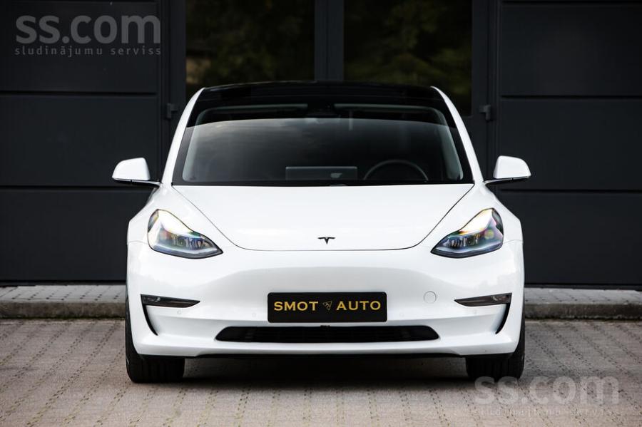 White Tesla Model 3 2021 in Riga, with an engine capacity of 0.00 L and mileage of 82 thousand km for 28500 €, photo 5 on AUTOMOTO.COM.LV