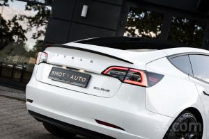 White Tesla Model 3 2021 in Riga, with an engine capacity of 0.00 L and mileage of 82 thousand km for 28500 €, photo 7 on AUTOMOTO.COM.LV