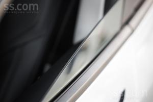 White Tesla Model 3 2021 in Riga, with an engine capacity of 0.00 L and mileage of 82 thousand km for 28500 €, photo 13 on AUTOMOTO.COM.LV