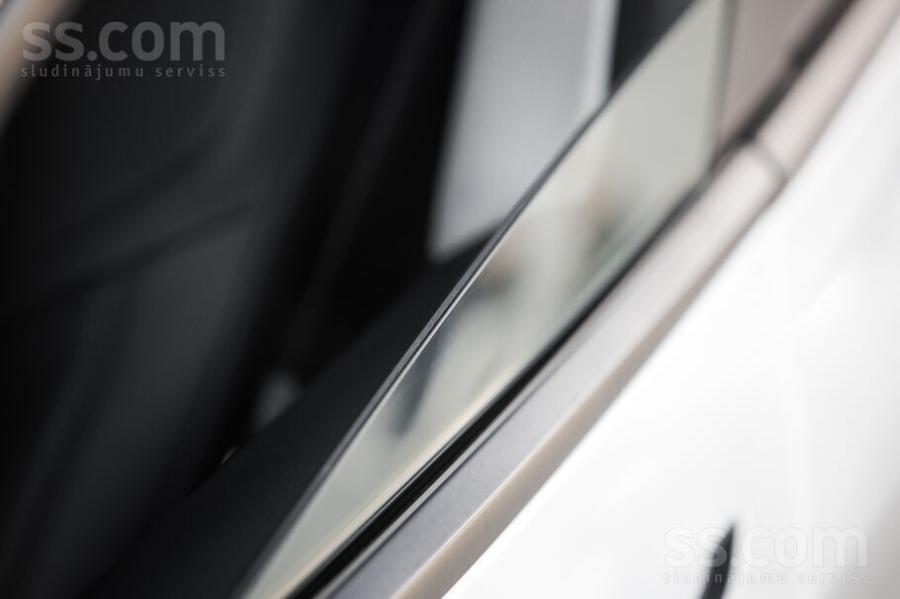 White Tesla Model 3 2021 in Riga, with an engine capacity of 0.00 L and mileage of 82 thousand km for 28500 €, photo 13 on AUTOMOTO.COM.LV