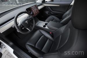 White Tesla Model 3 2021 in Riga, with an engine capacity of 0.00 L and mileage of 82 thousand km for 28500 €, photo 16 on AUTOMOTO.COM.LV