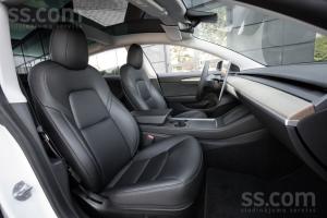 White Tesla Model 3 2021 in Riga, with an engine capacity of 0.00 L and mileage of 82 thousand km for 28500 €, photo 18 on AUTOMOTO.COM.LV