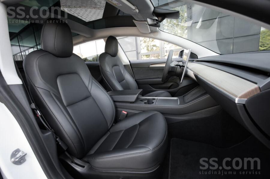 White Tesla Model 3 2021 in Riga, with an engine capacity of 0.00 L and mileage of 82 thousand km for 28500 €, photo 18 on AUTOMOTO.COM.LV