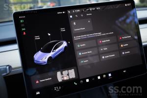 White Tesla Model 3 2021 in Riga, with an engine capacity of 0.00 L and mileage of 82 thousand km for 28500 €, photo 24 on AUTOMOTO.COM.LV