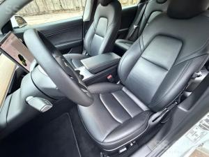 White Tesla Model 3 2021 in Riga, with an engine capacity of 0.00 L and mileage of 108 thousand km for 24300 €, photo 12 on AUTOMOTO.COM.LV