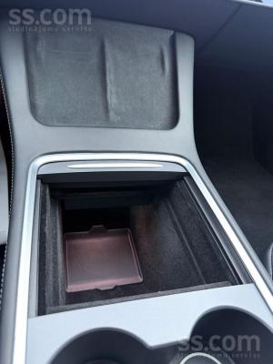 White Tesla Model 3 2021 in Riga, with an engine capacity of 0.00 L and mileage of 108 thousand km for 24300 €, photo 14 on AUTOMOTO.COM.LV