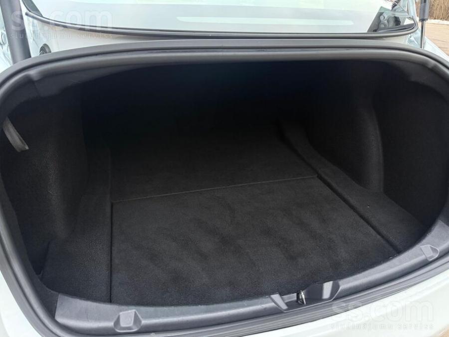 White Tesla Model 3 2021 in Riga, with an engine capacity of 0.00 L and mileage of 108 thousand km for 24300 €, photo 18 on AUTOMOTO.COM.LV