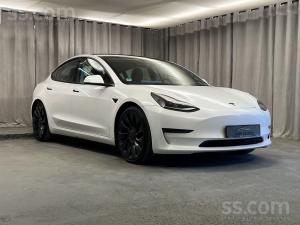White Tesla Model 3 2021 in Riga, with an engine capacity of 0.00 L and mileage of 103 thousand km for 26990 €, photo 4 on AUTOMOTO.COM.LV