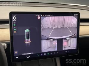 White Tesla Model 3 2021 in Riga, with an engine capacity of 0.00 L and mileage of 103 thousand km for 26990 €, photo 17 on AUTOMOTO.COM.LV