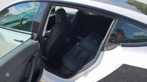 White Tesla Model 3 2021 in Vilnius, with an engine capacity of 0.00 L and mileage of 150 thousand km for 25000 €, photo 12 on AUTOMOTO.COM.LV
