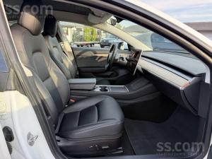 White Tesla Model 3 2021 in Jelgava, with an engine capacity of 0.00 L and mileage of 0 thousand km for 18900 €, photo 11 on AUTOMOTO.COM.LV
