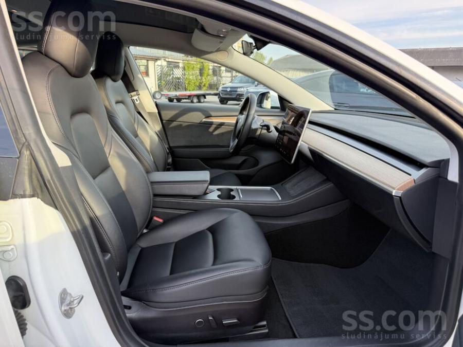 White Tesla Model 3 2021 in Jelgava, with an engine capacity of 0.00 L and mileage of 0 thousand km for 18900 €, photo 11 on AUTOMOTO.COM.LV