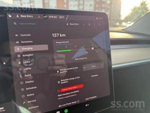 White Tesla Model 3 2021 in Jelgava, with an engine capacity of 0.00 L and mileage of 0 thousand km for 18900 €, photo 17 on AUTOMOTO.COM.LV