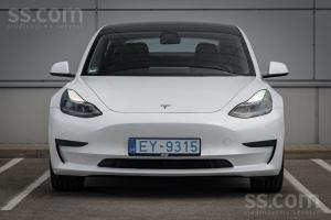 White Tesla Model 3 2021 in Riga, with an engine capacity of 0.00 L and mileage of 82 thousand km for 23990 €, photo 3 on AUTOMOTO.COM.LV