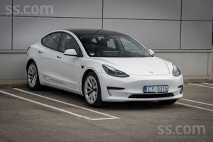 White Tesla Model 3 2021 in Riga, with an engine capacity of 0.00 L and mileage of 82 thousand km for 23990 €, photo 4 on AUTOMOTO.COM.LV