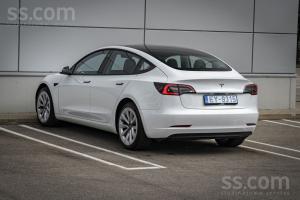 White Tesla Model 3 2021 in Riga, with an engine capacity of 0.00 L and mileage of 82 thousand km for 23990 €, photo 7 on AUTOMOTO.COM.LV