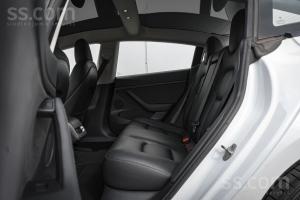 White Tesla Model 3 2021 in Riga, with an engine capacity of 0.00 L and mileage of 82 thousand km for 23990 €, photo 17 on AUTOMOTO.COM.LV