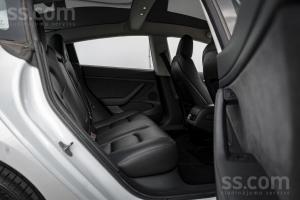 White Tesla Model 3 2021 in Riga, with an engine capacity of 0.00 L and mileage of 82 thousand km for 23990 €, photo 18 on AUTOMOTO.COM.LV