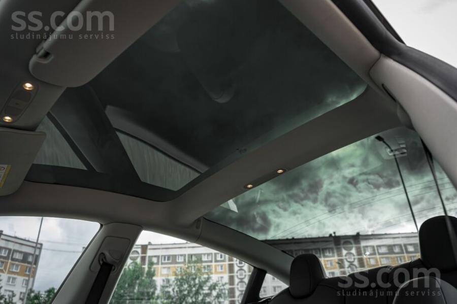 White Tesla Model 3 2021 in Riga, with an engine capacity of 0.00 L and mileage of 82 thousand km for 23990 €, photo 19 on AUTOMOTO.COM.LV