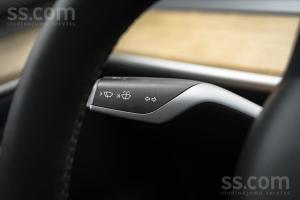 White Tesla Model 3 2021 in Riga, with an engine capacity of 0.00 L and mileage of 82 thousand km for 23990 €, photo 21 on AUTOMOTO.COM.LV