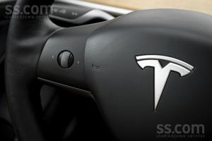 White Tesla Model 3 2021 in Riga, with an engine capacity of 0.00 L and mileage of 82 thousand km for 23990 €, photo 22 on AUTOMOTO.COM.LV