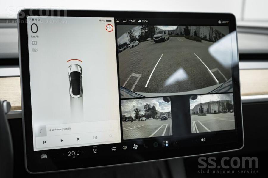 White Tesla Model 3 2021 in Riga, with an engine capacity of 0.00 L and mileage of 82 thousand km for 23990 €, photo 26 on AUTOMOTO.COM.LV