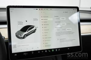 White Tesla Model 3 2021 in Riga, with an engine capacity of 0.00 L and mileage of 82 thousand km for 23990 €, photo 27 on AUTOMOTO.COM.LV