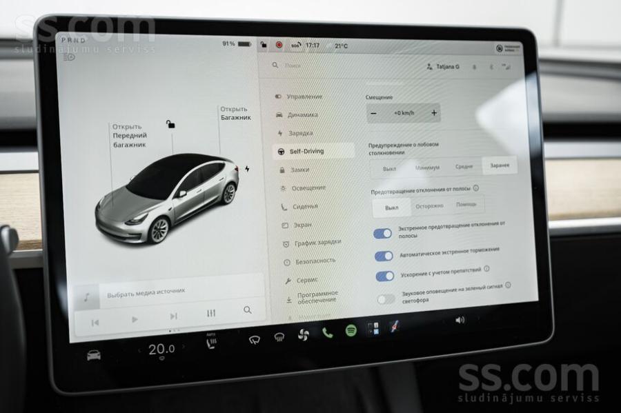 White Tesla Model 3 2021 in Riga, with an engine capacity of 0.00 L and mileage of 82 thousand km for 23990 €, photo 28 on AUTOMOTO.COM.LV