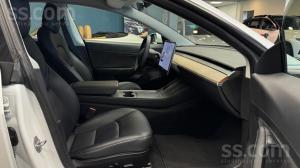 White Tesla Model 3 2021 in Riga, with an engine capacity of 0.00 L and mileage of 111 thousand km for 21990 €, photo 16 on AUTOMOTO.COM.LV