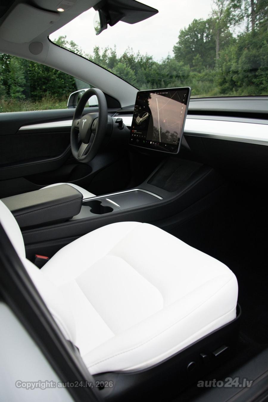 White Tesla Model 3 2021 in Parnu, with an engine capacity of 0.00 L and mileage of 101 thousand km for 25990 €, photo 15 on AUTOMOTO.COM.LV