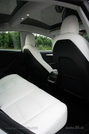 White Tesla Model 3 2021 in Parnu, with an engine capacity of 0.00 L and mileage of 101 thousand km for 25990 €, photo 18 on AUTOMOTO.COM.LV