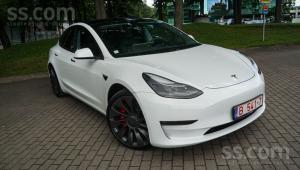 White Tesla Model 3 2021 in Riga, with an engine capacity of 0.00 L and mileage of 126 thousand km for 27450 €, photo 5 on AUTOMOTO.COM.LV