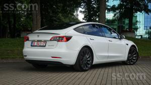 White Tesla Model 3 2021 in Riga, with an engine capacity of 0.00 L and mileage of 126 thousand km for 27450 €, photo 6 on AUTOMOTO.COM.LV