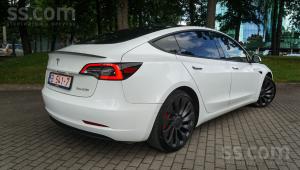 White Tesla Model 3 2021 in Riga, with an engine capacity of 0.00 L and mileage of 126 thousand km for 27450 €, photo 7 on AUTOMOTO.COM.LV