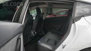 White Tesla Model 3 2021 in Riga, with an engine capacity of 0.00 L and mileage of 126 thousand km for 27450 €, photo 10 on AUTOMOTO.COM.LV