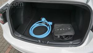 White Tesla Model 3 2021 in Riga, with an engine capacity of 0.00 L and mileage of 126 thousand km for 27450 €, photo 11 on AUTOMOTO.COM.LV