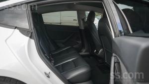 White Tesla Model 3 2021 in Riga, with an engine capacity of 0.00 L and mileage of 126 thousand km for 27450 €, photo 13 on AUTOMOTO.COM.LV