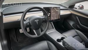 White Tesla Model 3 2021 in Riga, with an engine capacity of 0.00 L and mileage of 126 thousand km for 27450 €, photo 17 on AUTOMOTO.COM.LV