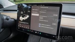 White Tesla Model 3 2021 in Riga, with an engine capacity of 0.00 L and mileage of 126 thousand km for 27450 €, photo 19 on AUTOMOTO.COM.LV