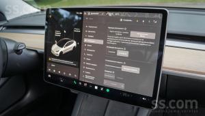 White Tesla Model 3 2021 in Riga, with an engine capacity of 0.00 L and mileage of 126 thousand km for 27450 €, photo 20 on AUTOMOTO.COM.LV