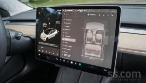 White Tesla Model 3 2021 in Riga, with an engine capacity of 0.00 L and mileage of 126 thousand km for 27450 €, photo 21 on AUTOMOTO.COM.LV